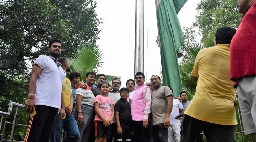 National flag hoisted on 111 fit high stainless steel beam on ...